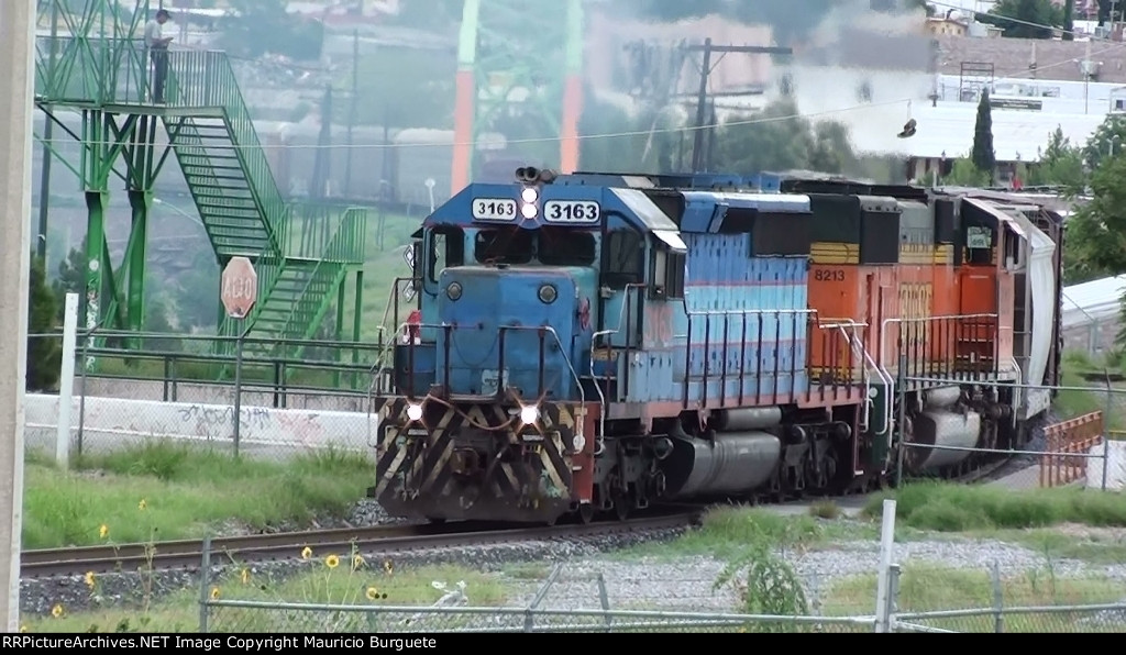Ferromex SD40 leading a mixed freight train